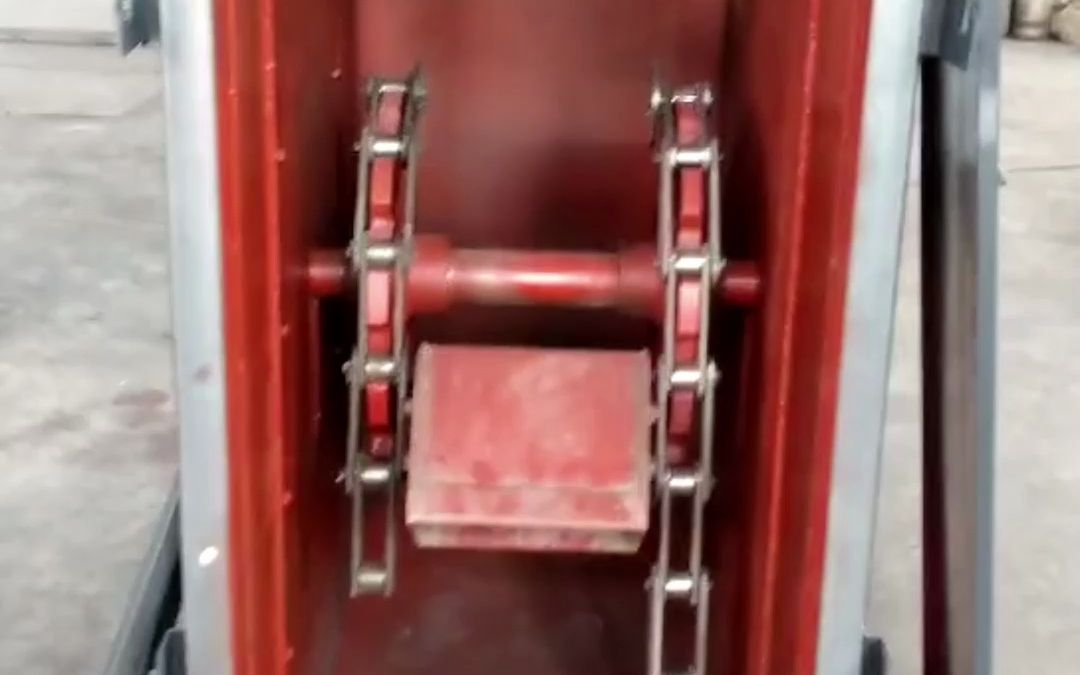 给铸造砂输送50吨产量的NE50双板链条料斗提升机