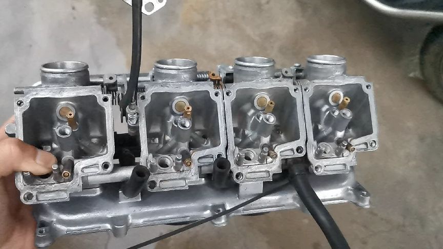 这样的化油器,清洗的还算干净吗?