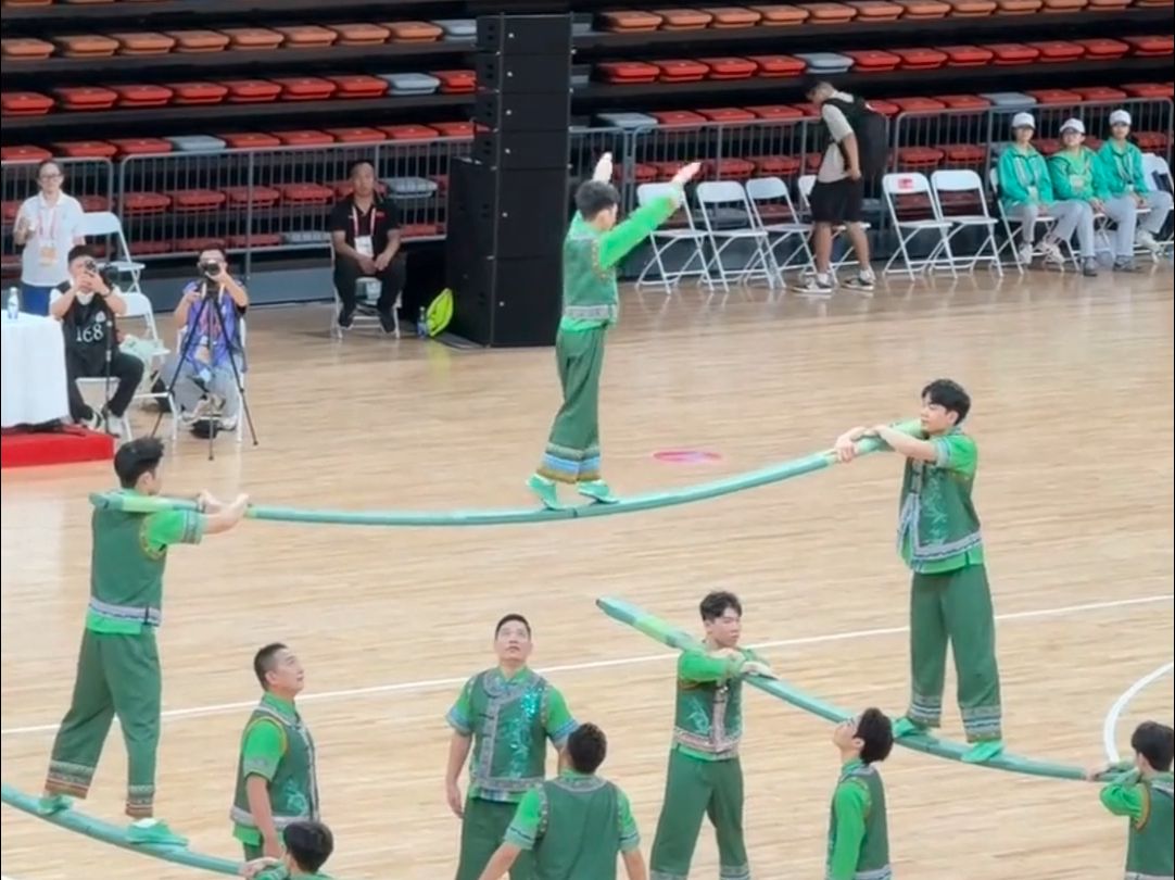 ...届全国少数民族传统体育运动会上的表演项目,《同心共“竹”中国梦...