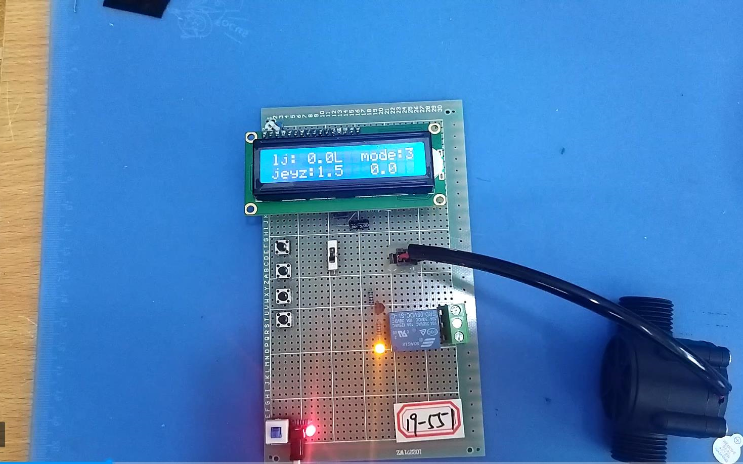 基于51单片机的自动加油机模拟控制器设计-3档拨动-LCD1602-流量-...