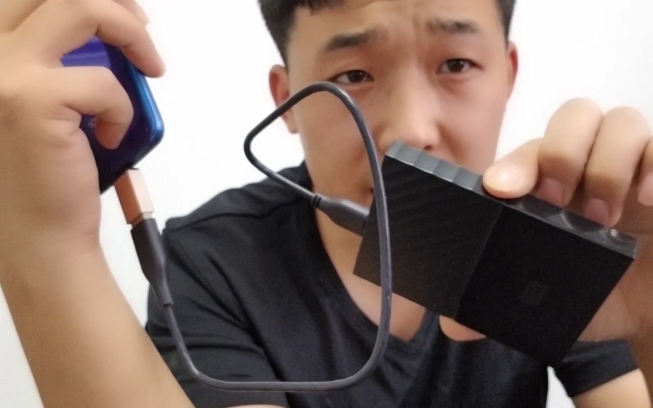 手机连接2T移动硬盘能读取文件吗？这样对硬盘有影响吗？实验一下