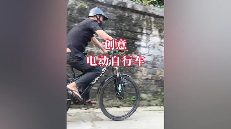高手利用风扇电机制作前驱电动自行车,创意十足