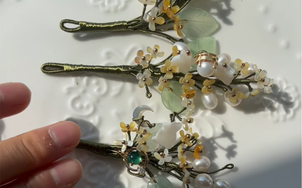 连夜赶制三款桂花,蝶贝天然石淡水珍珠,小兔子是淡水贝,还没想好加...