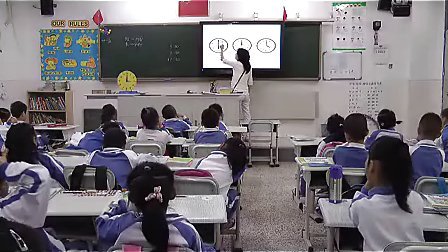 小学一年级数学,认识钟表:小明的一天教学视频北师大版林.