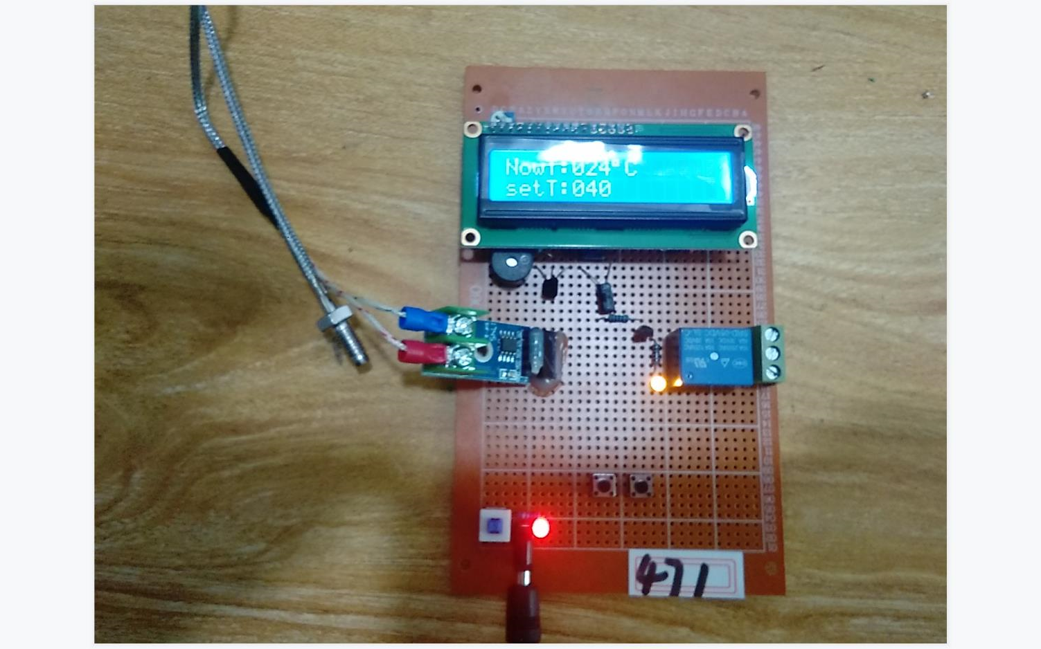 基于51单片机的智能热电偶工业锅炉温度控制恒温箱设计+蜂鸣器报警...