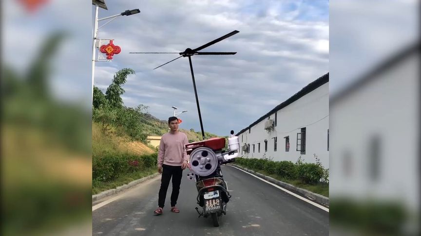 小伙把电动车改装成飞机试飞成功