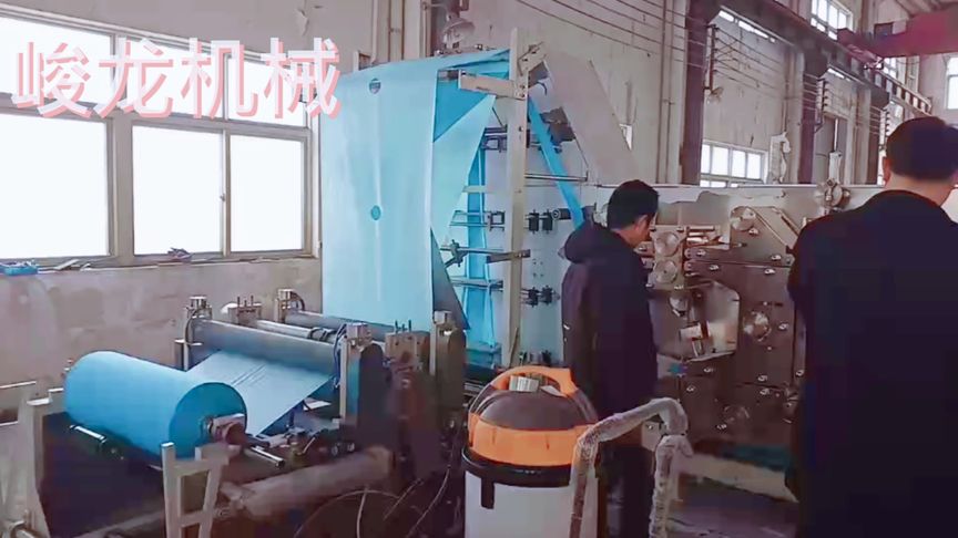 全自动床单折叠机手术洞巾机打孔床单治疗巾垫单浴巾生产设备