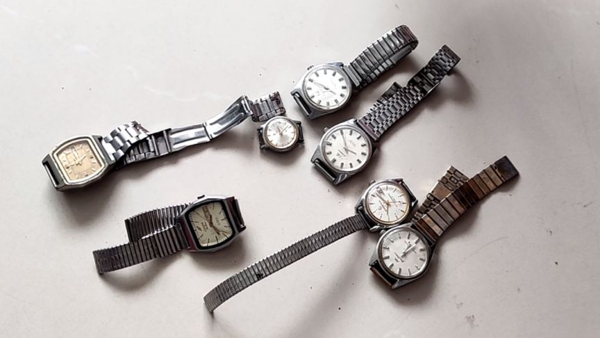 收几块瑞士手表和上海手表