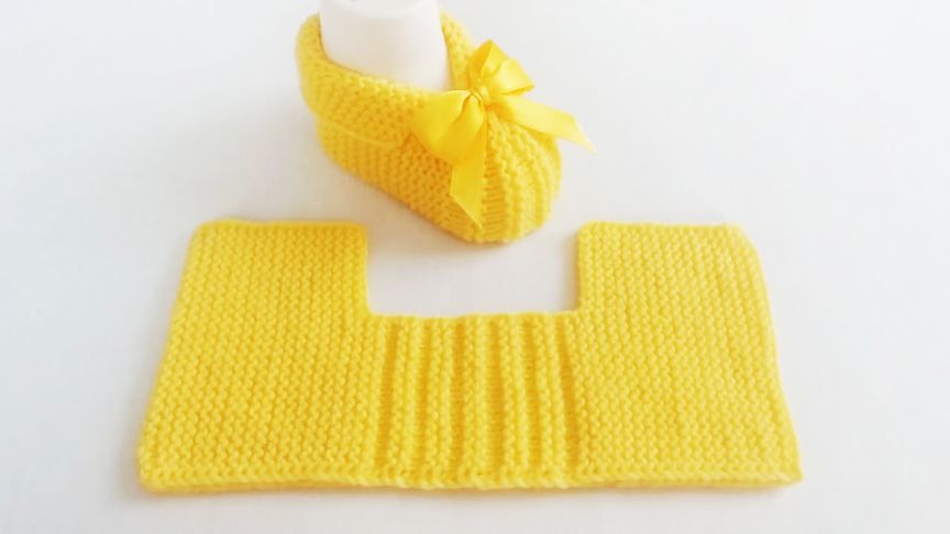 婴儿毛线鞋,棒针片织,缝合,配上花就完成,要不要织一双试试?