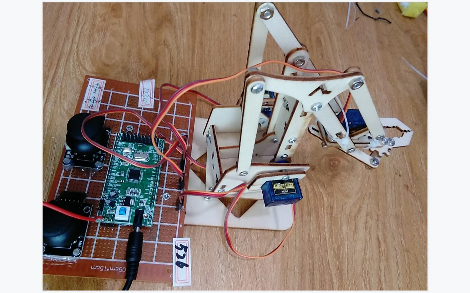 基于STM32单片机的智能机器人机械手云台机械臂搬运机器人设计-...
