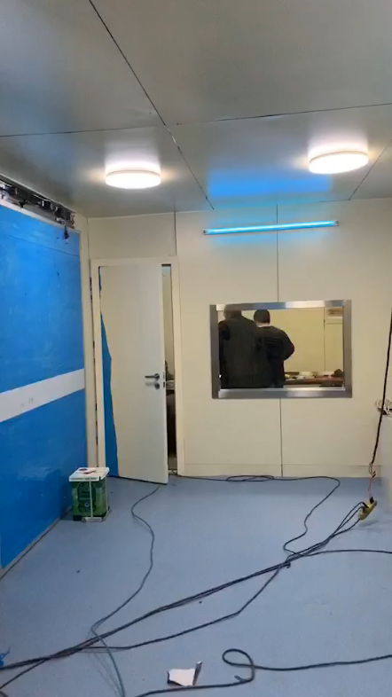 防辐射电动推拉铅门安装调试中,名工匠辐射