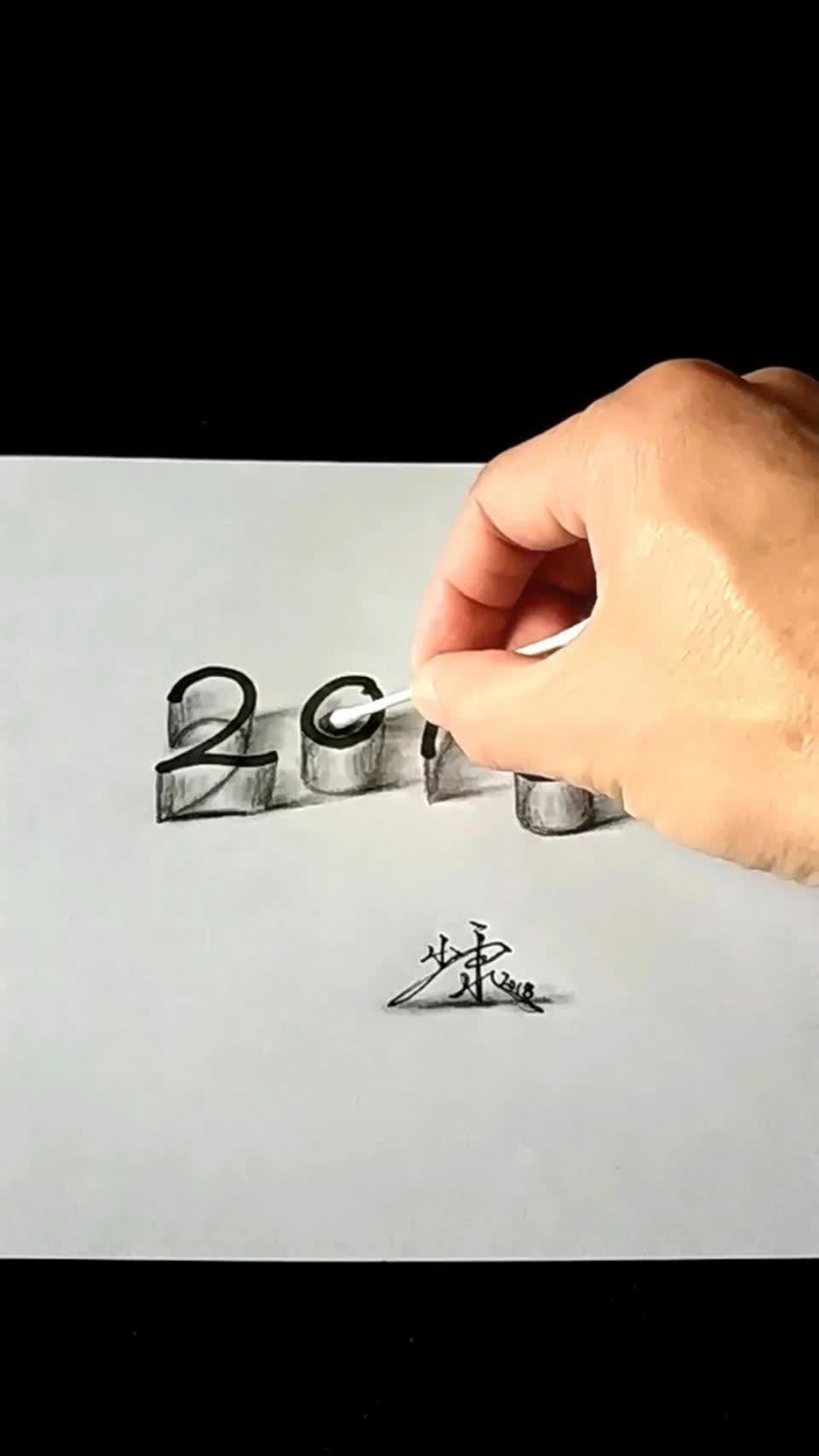 用两支笔写简单的立体字