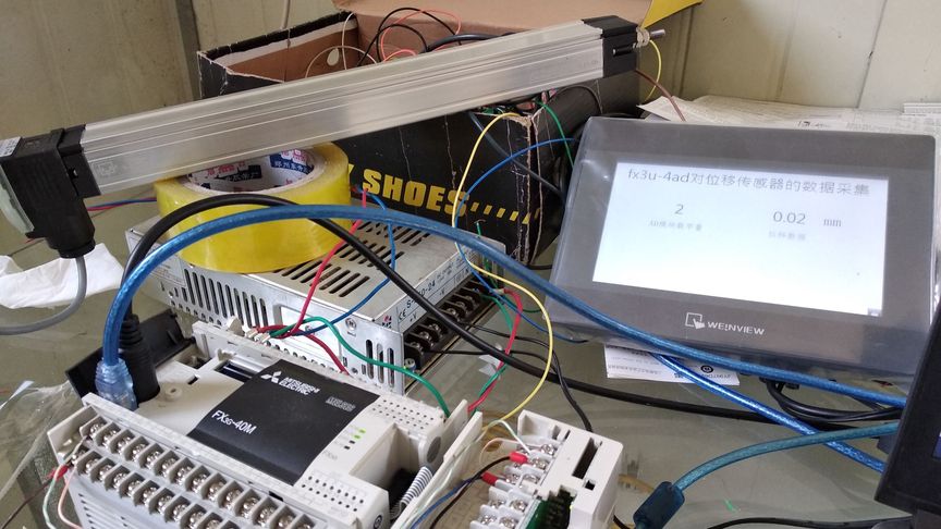 FX3U-4AD对位移传感器的数据采集
