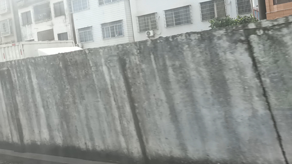 K230次列车(东莞东-昆明)出化州站跨越化州城区(2023年5月5日)