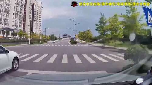 闯红灯的代价!电动车瞬间被撞飞,监控拍下惊险一幕