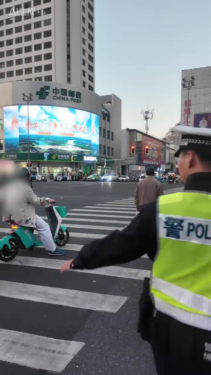 电动车闯红灯是严重的交通违法行为,交警依法处罚