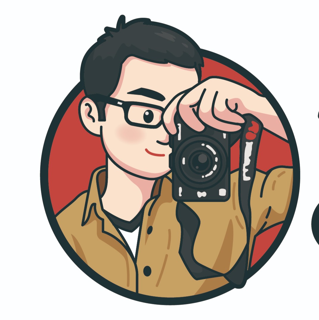 拿相机的托尼哥 