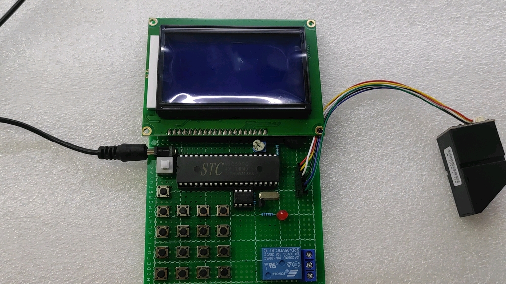 基于51单片机指纹密码锁设计指纹解锁开锁门禁管理系统设计AS608...