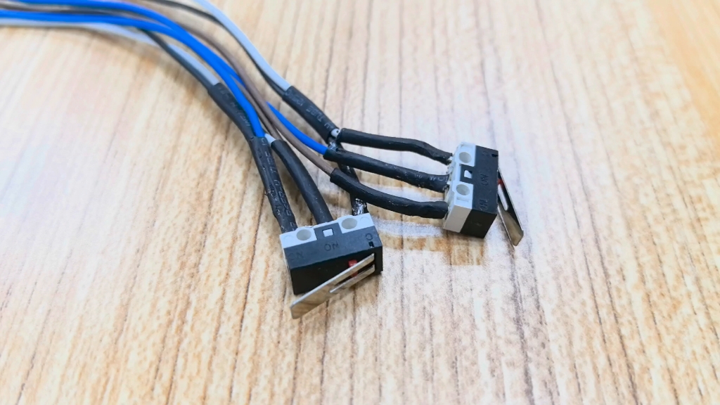 ...通过自己思考,想到了这个控制办法。利用5个微动开关,一个舵机实现...