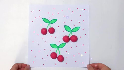 吃完的夏威夷果壳不要丢做一幅漂亮的樱桃画