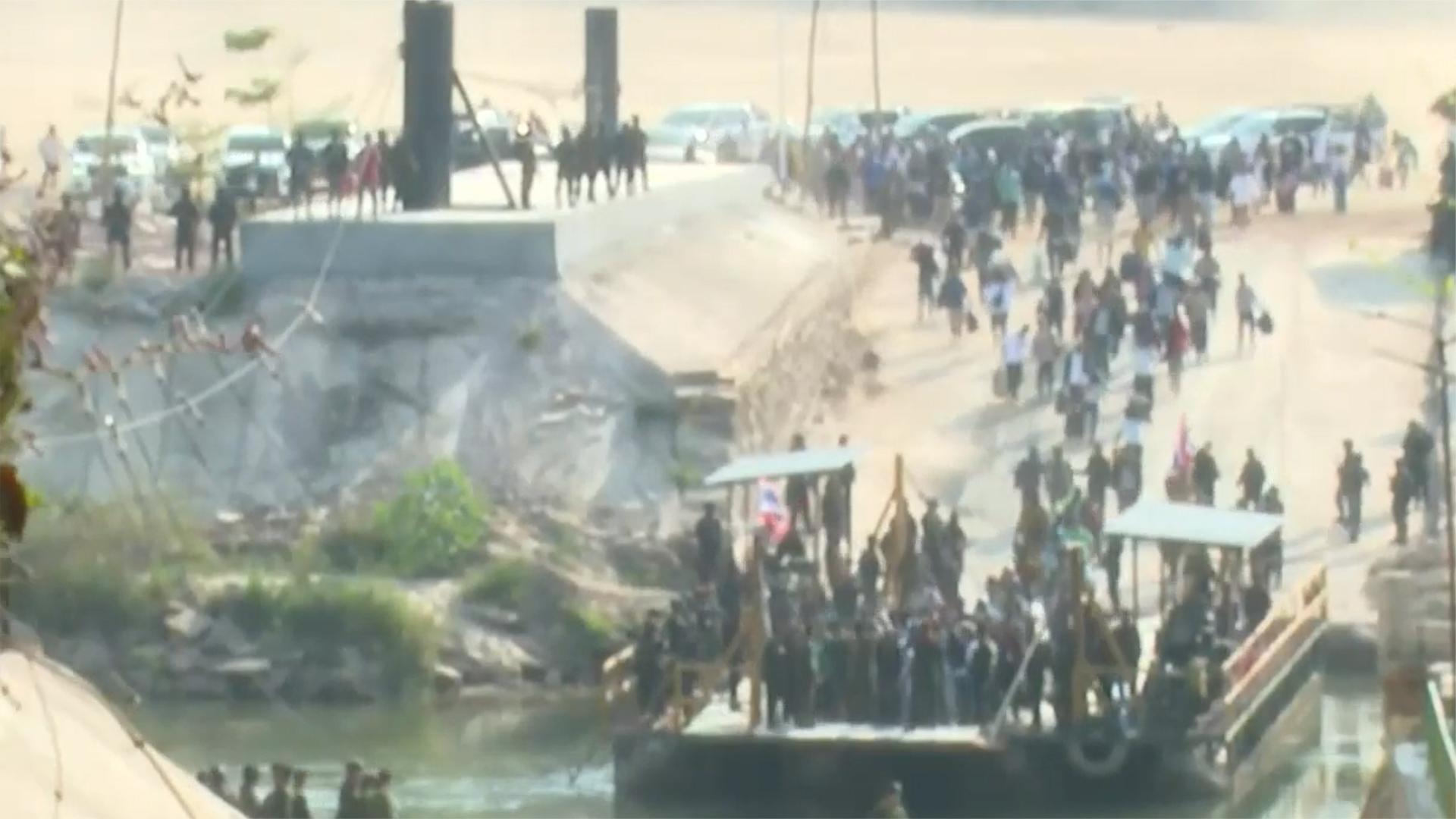 缅甸向泰移交261名电诈园区被解救人员 获救者携行李由泰军方护送