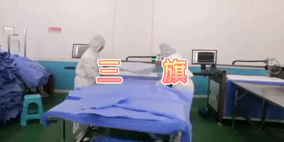 河南长垣手术衣生产设备 手术衣高速喷胶机 水性胶跟热熔胶自动化设备