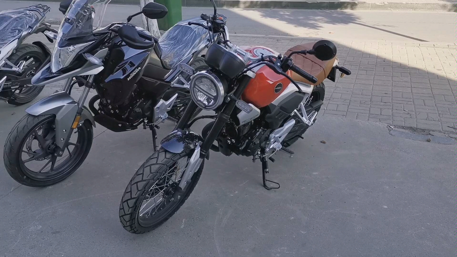 五羊本田鸷道190ss对比猛鸷