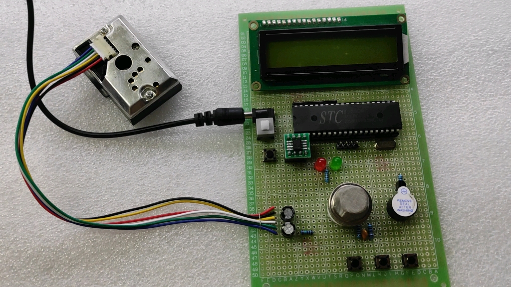51单片机PM2.5粉尘检测传感器+MQ-135空气质量检测设计