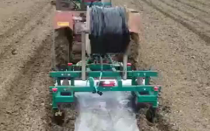 拖拉机带滴管带喷药覆膜机