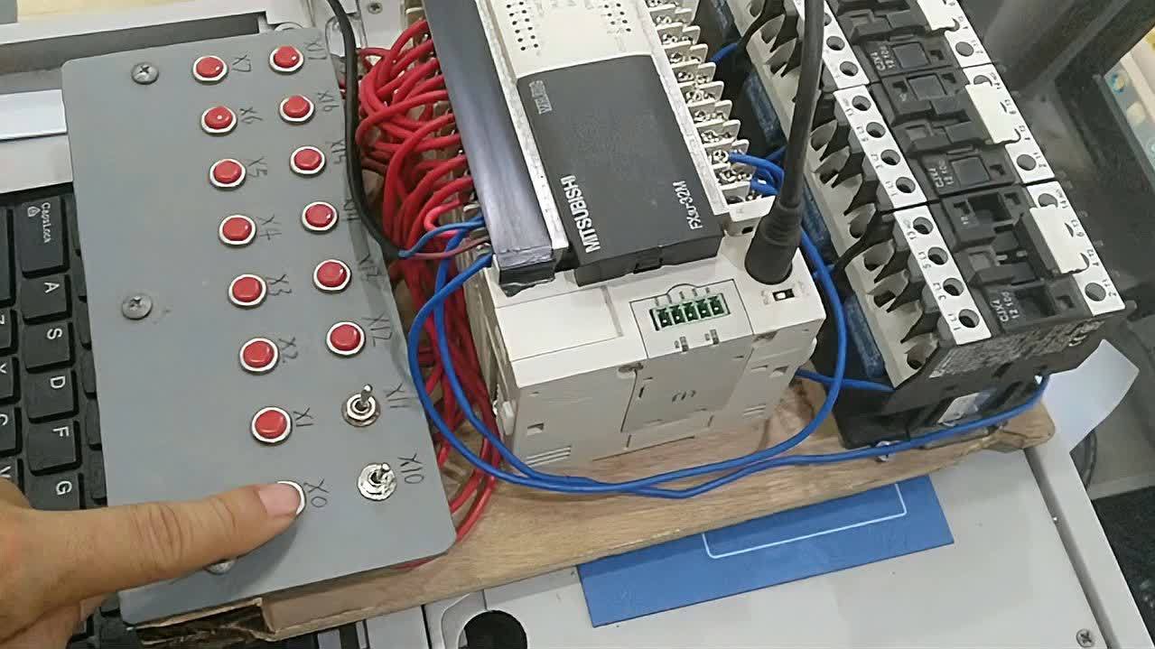 三菱PLC普通逻辑指令按下接通,再按下断开