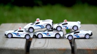 英文儿歌和玩具车:各种类型的警车模型,儿童合金汽车试玩
