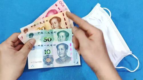 "口罩鉴别假币新方法:轻松判断真假钱币技巧揭秘"