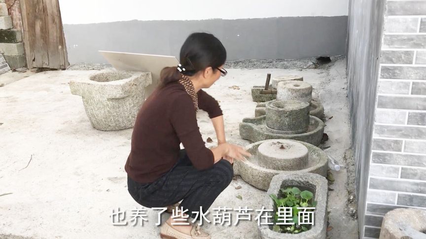 农村非物质文化遗产,中华传统石磨,这家农民用石器装饰院子