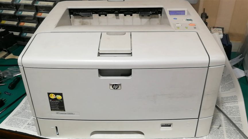 HP5200打印机显示清理送纸道和13.06是怎么回事?如何维修是个谜