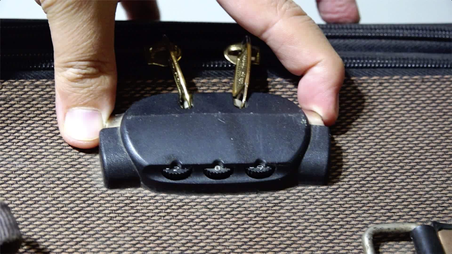 行李箱的密码锁打不