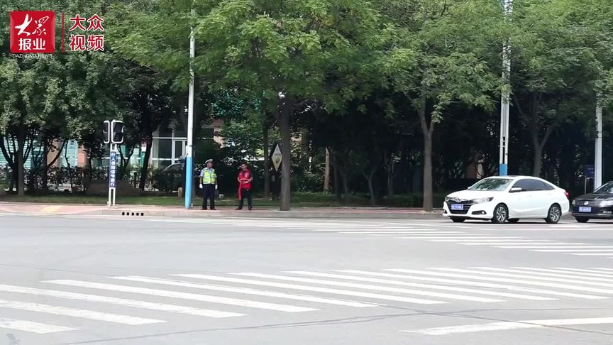 视频|文明交通劝导,志愿者在行动
