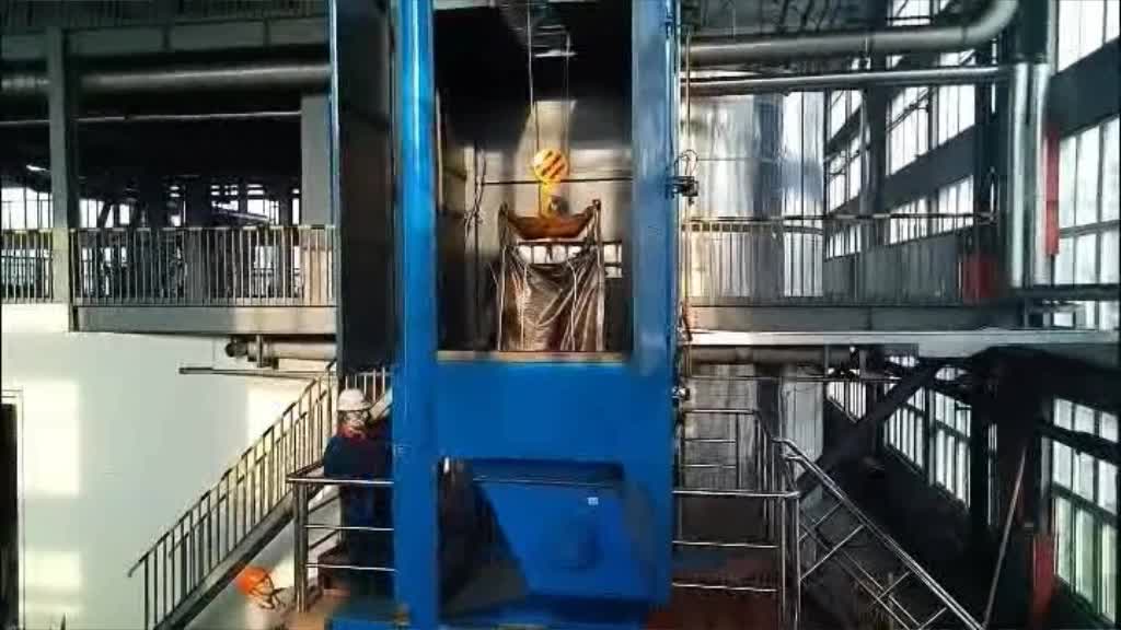 重钙粉吨袋卸料机 粉体吨袋拆袋机客户使用现场