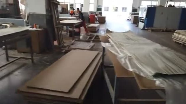 实木复合门规模化生产,十多台展鸿正负压机