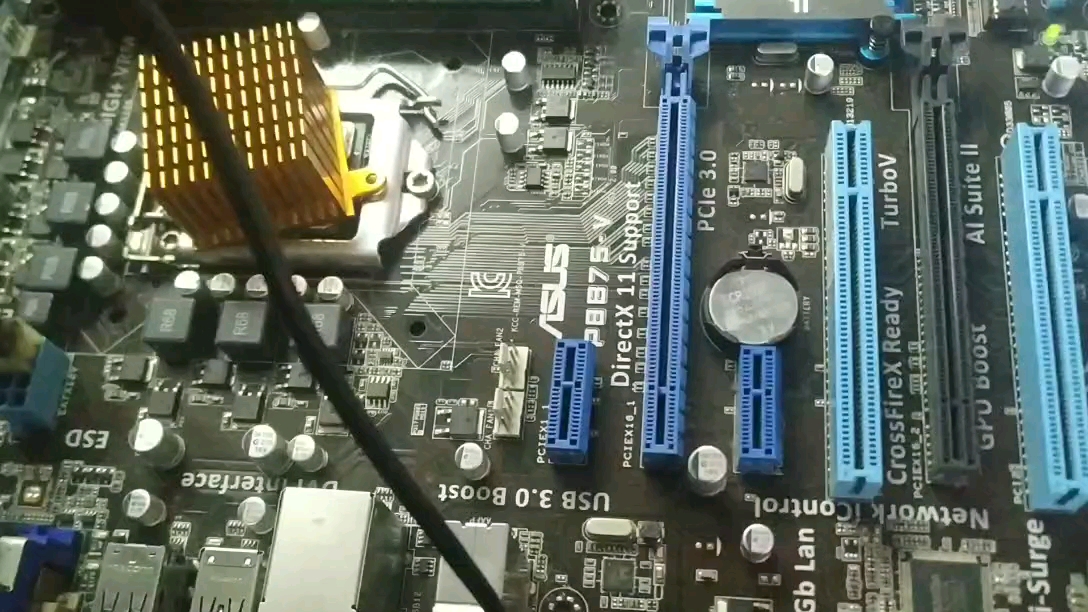 两块华硕b75主板维修