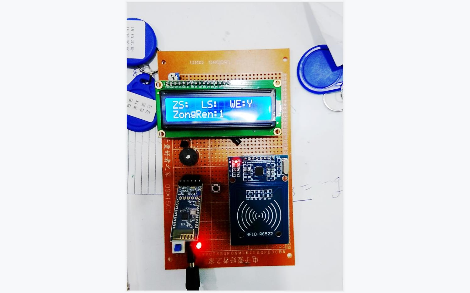 基于51单片机的射频RFID卡考勤人数计数统计系统设计+蓝牙手机APP...