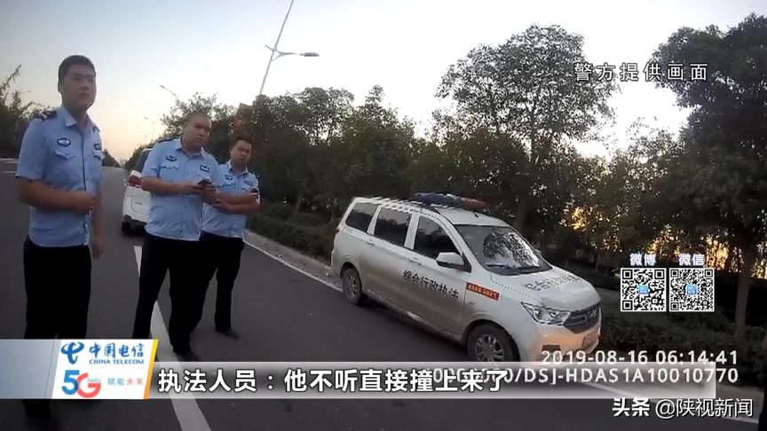 ...一无牌垃圾车在泾河新城碰上城管执法人员后,直接将7座城管执法车...