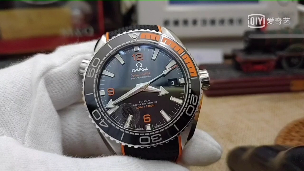 视频讲解VS欧米茄海马600四分之一橙机械手表怎么调时间日历上发条...