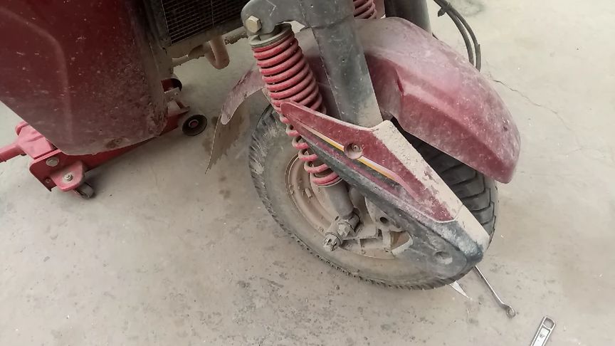 三轮摩托车开起来方向把来回摆动难道都是压力轴承坏了!