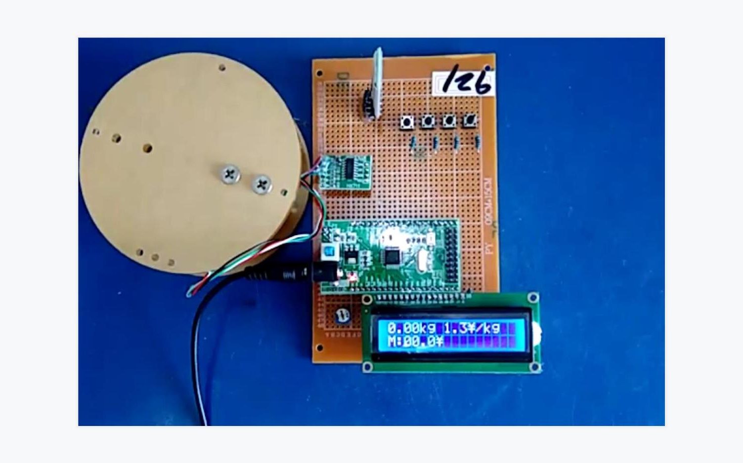 基于STM32单片机的智能电子秤称重累计总价去毛皮系统设计+蓝牙...