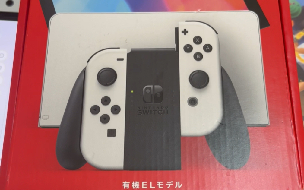 出switch oled日版黑白配色主机,另外避雷闲鱼内存卡售卖店铺“冰雪...