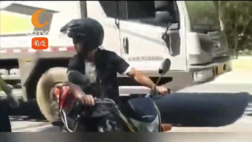 骑摩托车不戴头盔等违法行为将被严查 请自觉佩戴头盔