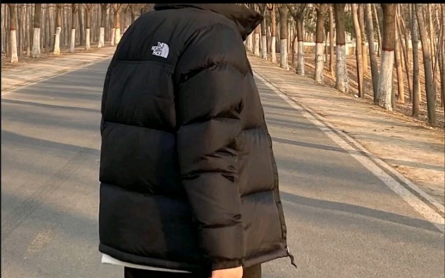 北面羽绒服如何搭配?