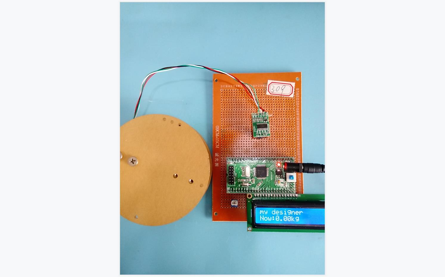 基于MSP430F149单片机的称重系统智能电子秤的设计-HX711-LCD...